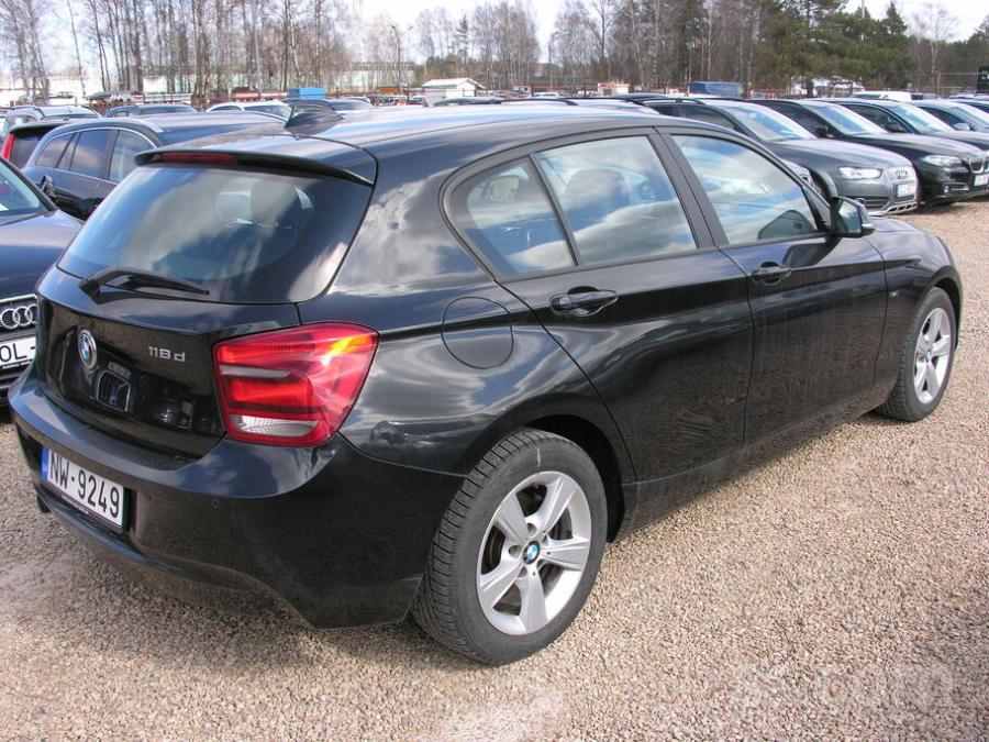 Black BMW 118 2012 in Riga, with an engine capacity of 2.00 L and mileage of 0 thousand km for 8550 €, photo 4 on AUTOMOTO.COM.LV
