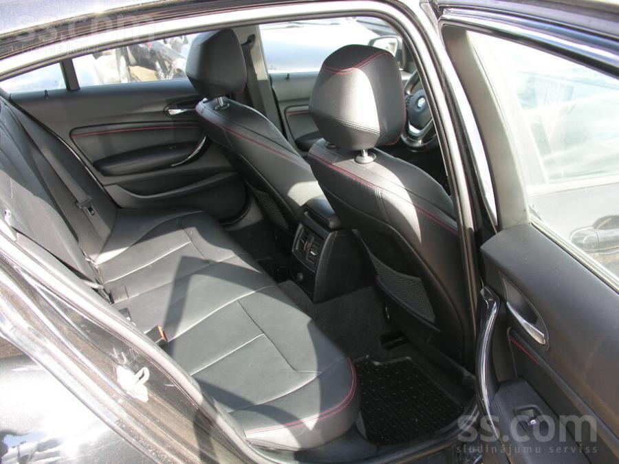 Black BMW 118 2012 in Riga, with an engine capacity of 2.00 L and mileage of 0 thousand km for 8550 €, photo 8 on AUTOMOTO.COM.LV