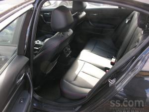 Black BMW 118 2012 in Riga, with an engine capacity of 2.00 L and mileage of 0 thousand km for 8550 €, photo 9 on AUTOMOTO.COM.LV
