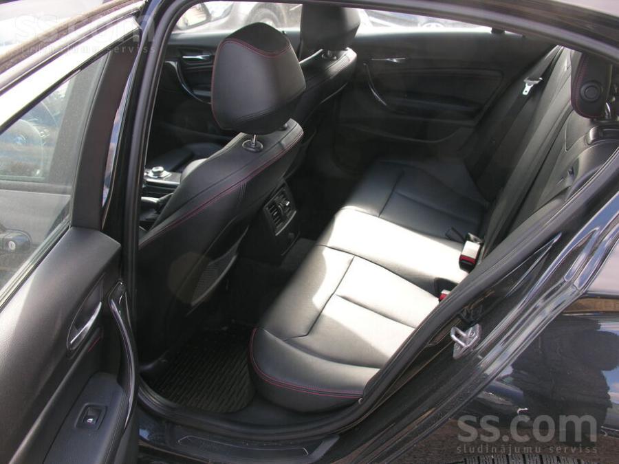 Black BMW 118 2012 in Riga, with an engine capacity of 2.00 L and mileage of 0 thousand km for 8550 €, photo 9 on AUTOMOTO.COM.LV