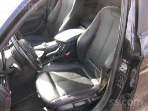 Black BMW 118 2012 in Riga, with an engine capacity of 2.00 L and mileage of 0 thousand km for 8550 €, photo 11 on AUTOMOTO.COM.LV