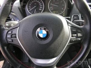Black BMW 118 2012 in Riga, with an engine capacity of 2.00 L and mileage of 0 thousand km for 8550 €, photo 13 on AUTOMOTO.COM.LV