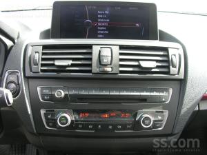 Black BMW 118 2012 in Riga, with an engine capacity of 2.00 L and mileage of 0 thousand km for 8550 €, photo 14 on AUTOMOTO.COM.LV