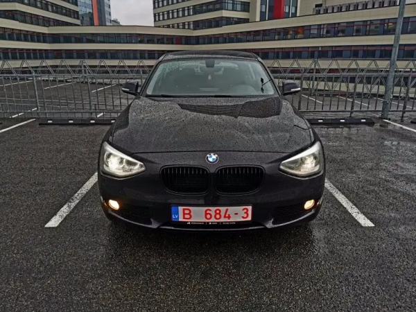 Black BMW 118 2012 in Riga, with an engine capacity of 2.00 L and mileage of 235 thousand km for 9990 €, photo 2 on AUTOMOTO.COM.LV