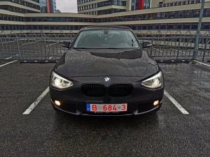 Black BMW 118 2012 in Riga, with an engine capacity of 2.00 L and mileage of 235 thousand km for 9990 €, photo 3 on AUTOMOTO.COM.LV