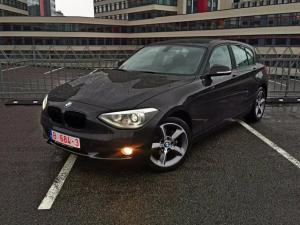 Black BMW 118 2012 in Riga, with an engine capacity of 2.00 L and mileage of 235 thousand km for 9990 €, photo 4 on AUTOMOTO.COM.LV