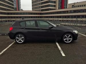 Black BMW 118 2012 in Riga, with an engine capacity of 2.00 L and mileage of 235 thousand km for 9990 €, photo 5 on AUTOMOTO.COM.LV
