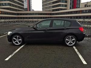Black BMW 118 2012 in Riga, with an engine capacity of 2.00 L and mileage of 235 thousand km for 9990 €, photo 6 on AUTOMOTO.COM.LV