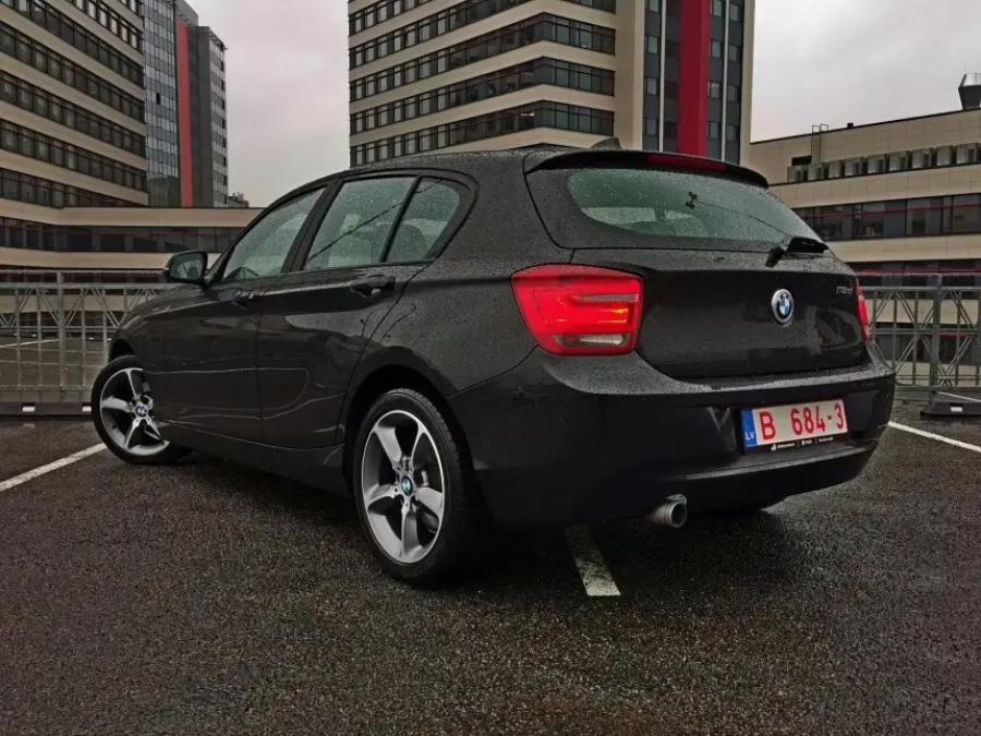 Black BMW 118 2012 in Riga, with an engine capacity of 2.00 L and mileage of 235 thousand km for 9990 €, photo 7 on AUTOMOTO.COM.LV