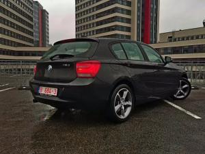 Black BMW 118 2012 in Riga, with an engine capacity of 2.00 L and mileage of 235 thousand km for 9990 €, photo 8 on AUTOMOTO.COM.LV