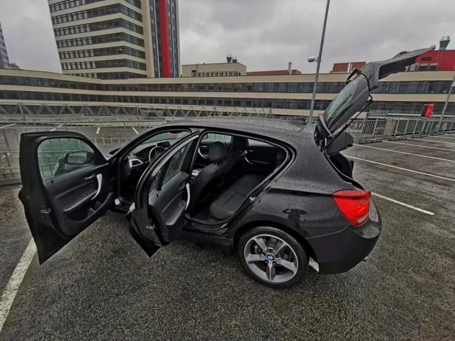Black BMW 118 2012 in Riga, with an engine capacity of 2.00 L and mileage of 235 thousand km for 9990 €, photo 9 on AUTOMOTO.COM.LV