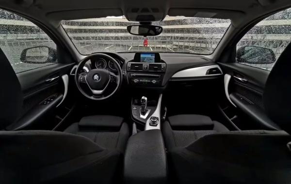 Black BMW 118 2012 in Riga, with an engine capacity of 2.00 L and mileage of 235 thousand km for 9990 €, photo 10 on AUTOMOTO.COM.LV