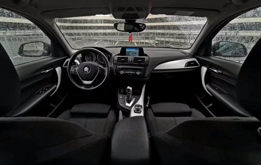 Black BMW 118 2012 in Riga, with an engine capacity of 2.00 L and mileage of 235 thousand km for 9990 €, photo 11 on AUTOMOTO.COM.LV