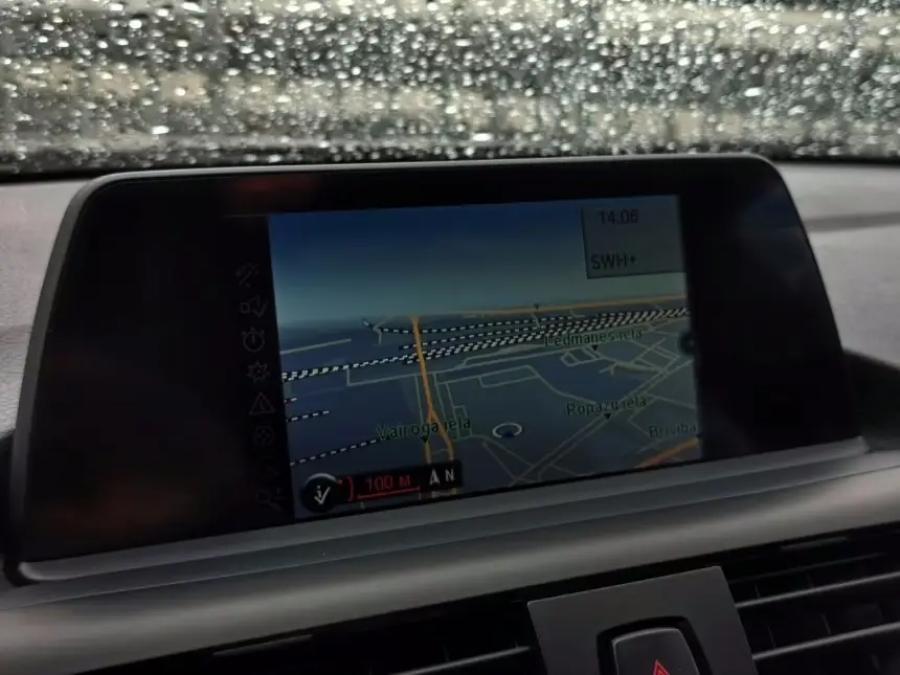Black BMW 118 2012 in Riga, with an engine capacity of 2.00 L and mileage of 235 thousand km for 9990 €, photo 16 on AUTOMOTO.COM.LV