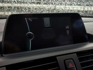 Black BMW 118 2012 in Riga, with an engine capacity of 2.00 L and mileage of 235 thousand km for 9990 €, photo 17 on AUTOMOTO.COM.LV