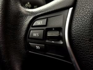 Black BMW 118 2012 in Riga, with an engine capacity of 2.00 L and mileage of 235 thousand km for 9990 €, photo 18 on AUTOMOTO.COM.LV