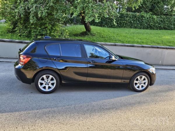 Black BMW 118 2012 in Jekabpils, with an engine capacity of 2.00 L and mileage of 297 thousand km for 6490 €, photo 5 on AUTOMOTO.COM.LV
