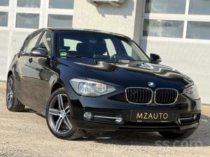 Black BMW 118 2012 in Tukums, with an engine capacity of 2.00 L and mileage of 259 thousand km for 6300 €, photo  on AUTOMOTO.COM.LV