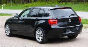 Black BMW 118 2012 in Kretinga, with an engine capacity of 2.00 L and mileage of 139 thousand km for 7499 €, photo 10 on AUTOMOTO.COM.LV