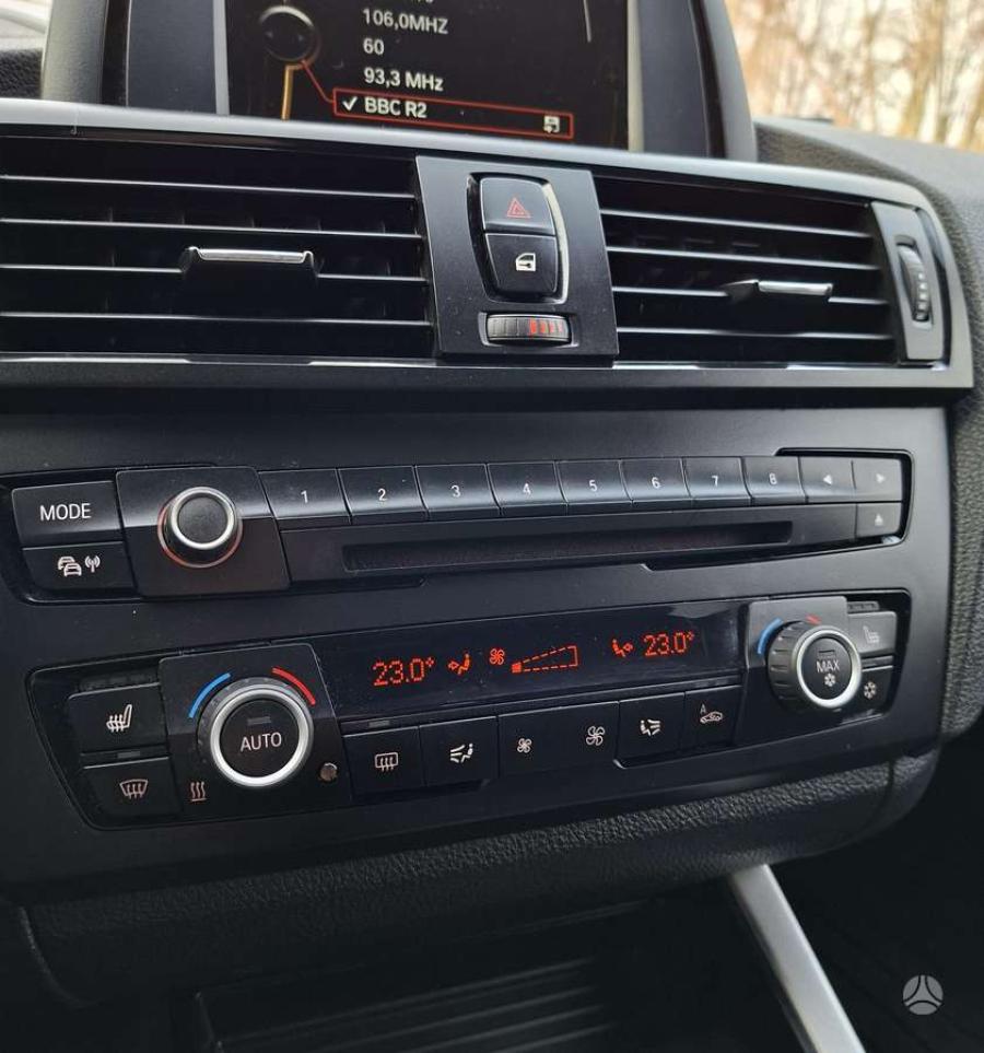 Black BMW 118 2012 in Kretinga, with an engine capacity of 2.00 L and mileage of 139 thousand km for 7499 €, photo 30 on AUTOMOTO.COM.LV