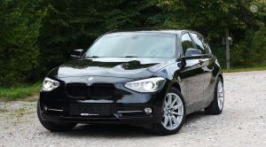 Black BMW 118 2012 in Kretinga, with an engine capacity of 2.00 L and mileage of 139 thousand km for 6899 €, photo  on AUTOMOTO.COM.LV