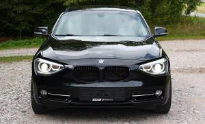 Black BMW 118 2012 in Kretinga, with an engine capacity of 2.00 L and mileage of 139 thousand km for 6899 €, photo 4 on AUTOMOTO.COM.LV