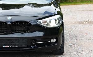 Black BMW 118 2012 in Kretinga, with an engine capacity of 2.00 L and mileage of 139 thousand km for 6899 €, photo 6 on AUTOMOTO.COM.LV