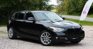 Black BMW 118 2012 in Kretinga, with an engine capacity of 2.00 L and mileage of 139 thousand km for 6899 €, photo 8 on AUTOMOTO.COM.LV