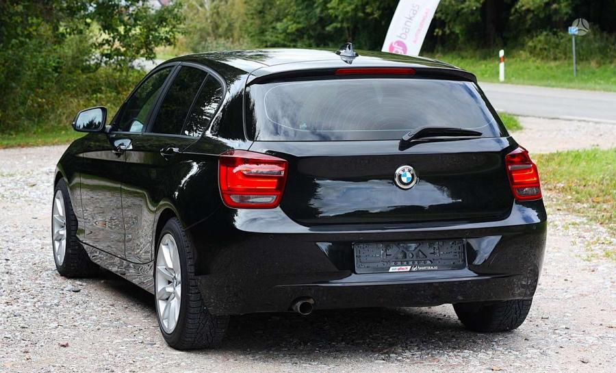 Black BMW 118 2012 in Kretinga, with an engine capacity of 2.00 L and mileage of 139 thousand km for 6899 €, photo 12 on AUTOMOTO.COM.LV
