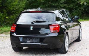 Black BMW 118 2012 in Kretinga, with an engine capacity of 2.00 L and mileage of 139 thousand km for 6899 €, photo 15 on AUTOMOTO.COM.LV