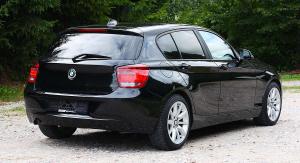Black BMW 118 2012 in Kretinga, with an engine capacity of 2.00 L and mileage of 139 thousand km for 6899 €, photo 16 on AUTOMOTO.COM.LV