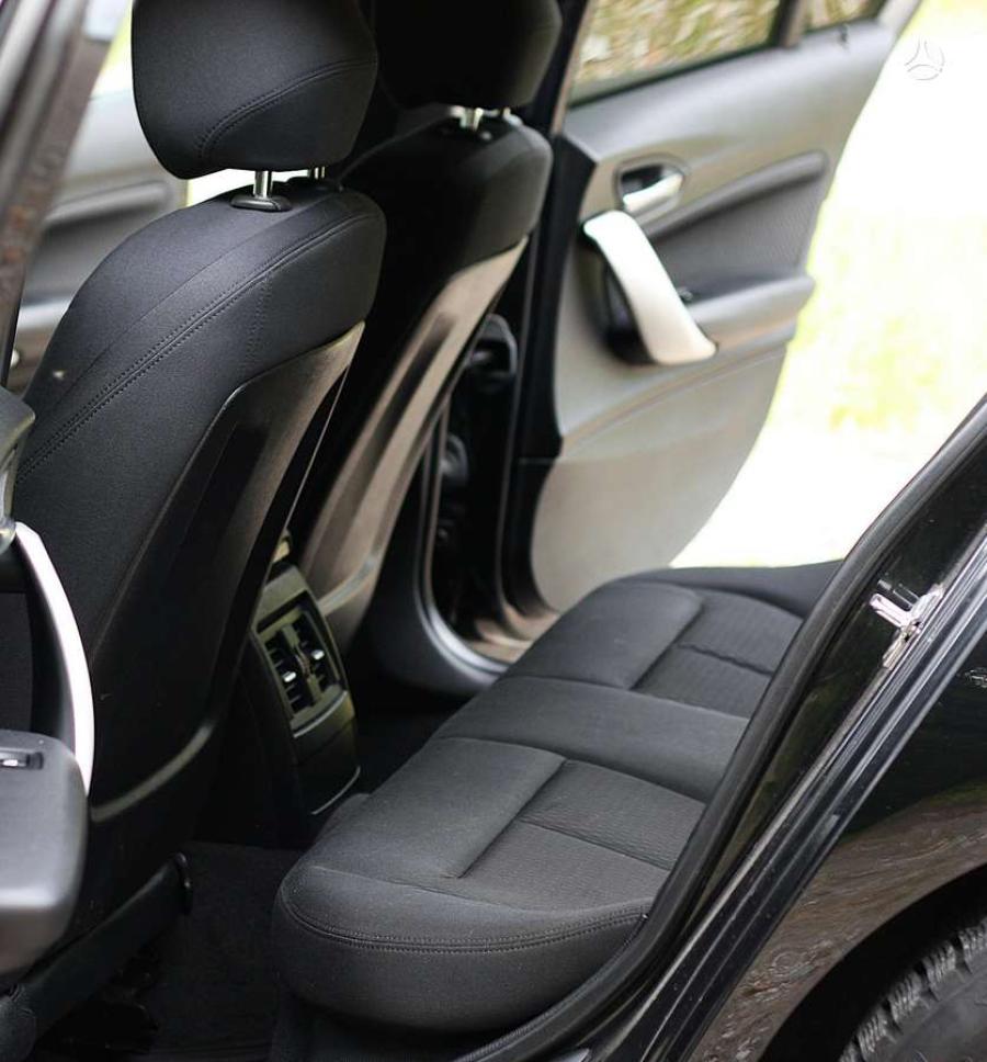 Black BMW 118 2012 in Kretinga, with an engine capacity of 2.00 L and mileage of 139 thousand km for 6899 €, photo 20 on AUTOMOTO.COM.LV