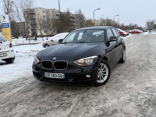 Black BMW 118 2013 in Panevezys, with an engine capacity of 2.00 L and mileage of 253 thousand km for 6690 €, photo 5 on AUTOMOTO.COM.LV