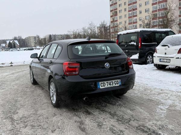 Black BMW 118 2013 in Panevezys, with an engine capacity of 2.00 L and mileage of 253 thousand km for 6690 €, photo 7 on AUTOMOTO.COM.LV