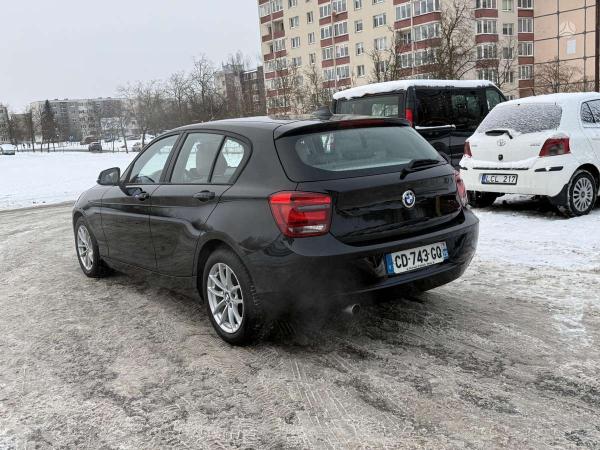 Black BMW 118 2013 in Panevezys, with an engine capacity of 2.00 L and mileage of 253 thousand km for 6690 €, photo 9 on AUTOMOTO.COM.LV