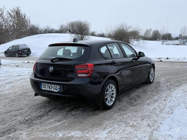 Black BMW 118 2013 in Panevezys, with an engine capacity of 2.00 L and mileage of 253 thousand km for 6690 €, photo 10 on AUTOMOTO.COM.LV