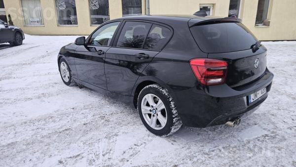 Black BMW 118 2013 in Riga, with an engine capacity of 2.00 L and mileage of 302 thousand km for 6500 €, photo 5 on AUTOMOTO.COM.LV