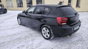 Black BMW 118 2013 in Riga, with an engine capacity of 2.00 L and mileage of 302 thousand km for 6500 €, photo 5 on AUTOMOTO.COM.LV