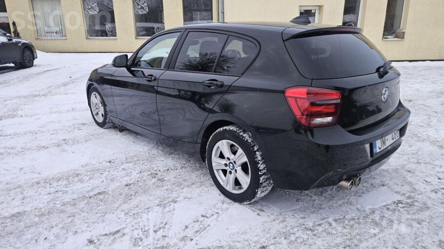 Black BMW 118 2013 in Riga, with an engine capacity of 2.00 L and mileage of 302 thousand km for 6500 €, photo 5 on AUTOMOTO.COM.LV