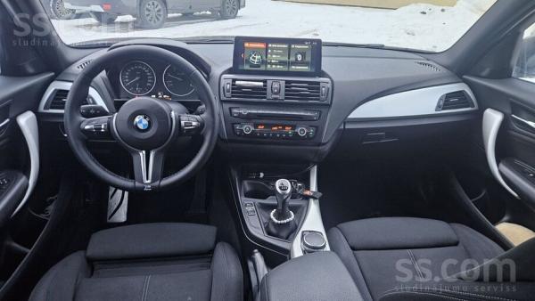 Black BMW 118 2013 in Riga, with an engine capacity of 2.00 L and mileage of 302 thousand km for 6500 €, photo 7 on AUTOMOTO.COM.LV