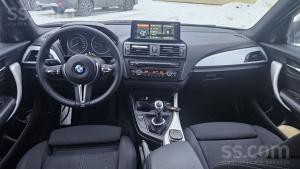 Black BMW 118 2013 in Riga, with an engine capacity of 2.00 L and mileage of 302 thousand km for 6500 €, photo 7 on AUTOMOTO.COM.LV
