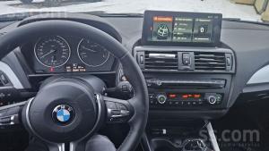 Black BMW 118 2013 in Riga, with an engine capacity of 2.00 L and mileage of 302 thousand km for 6500 €, photo 12 on AUTOMOTO.COM.LV