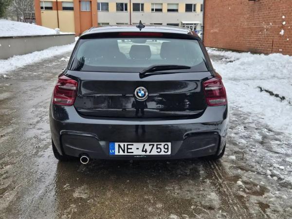 Black BMW 118 2013 in Jekabpils, with an engine capacity of 2.00 L and mileage of 295 thousand km for 6490 €, photo 8 on AUTOMOTO.COM.LV