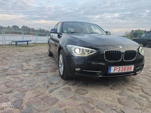 Melns BMW 118 2013 Šilutė, ar dzinēja tilpumu 2.00 L un nobraukumu 245 tūkst. km par 6400 €, foto  vietnē AUTOMOTO.COM.LV