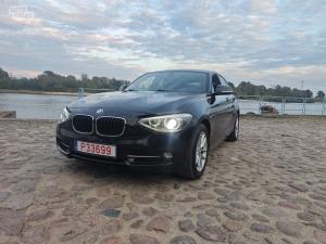 Black BMW 118 2013 in Silute, with an engine capacity of 2.00 L and mileage of 245 thousand km for 6400 €, photo 3 on AUTOMOTO.COM.LV