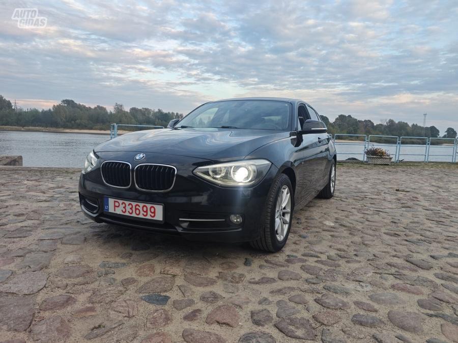 Black BMW 118 2013 in Silute, with an engine capacity of 2.00 L and mileage of 245 thousand km for 6400 €, photo 3 on AUTOMOTO.COM.LV