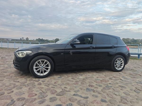 Black BMW 118 2013 in Silute, with an engine capacity of 2.00 L and mileage of 245 thousand km for 6400 €, photo 4 on AUTOMOTO.COM.LV