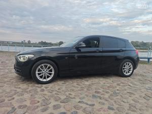 Black BMW 118 2013 in Silute, with an engine capacity of 2.00 L and mileage of 245 thousand km for 6400 €, photo 4 on AUTOMOTO.COM.LV