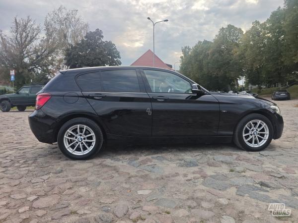 Black BMW 118 2013 in Silute, with an engine capacity of 2.00 L and mileage of 245 thousand km for 6400 €, photo 7 on AUTOMOTO.COM.LV
