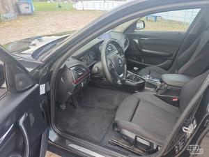 Black BMW 118 2013 in Silute, with an engine capacity of 2.00 L and mileage of 245 thousand km for 6400 €, photo 9 on AUTOMOTO.COM.LV